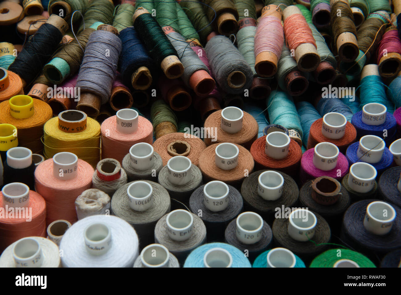 group of multicolored threads top view Stock Photo - Alamy