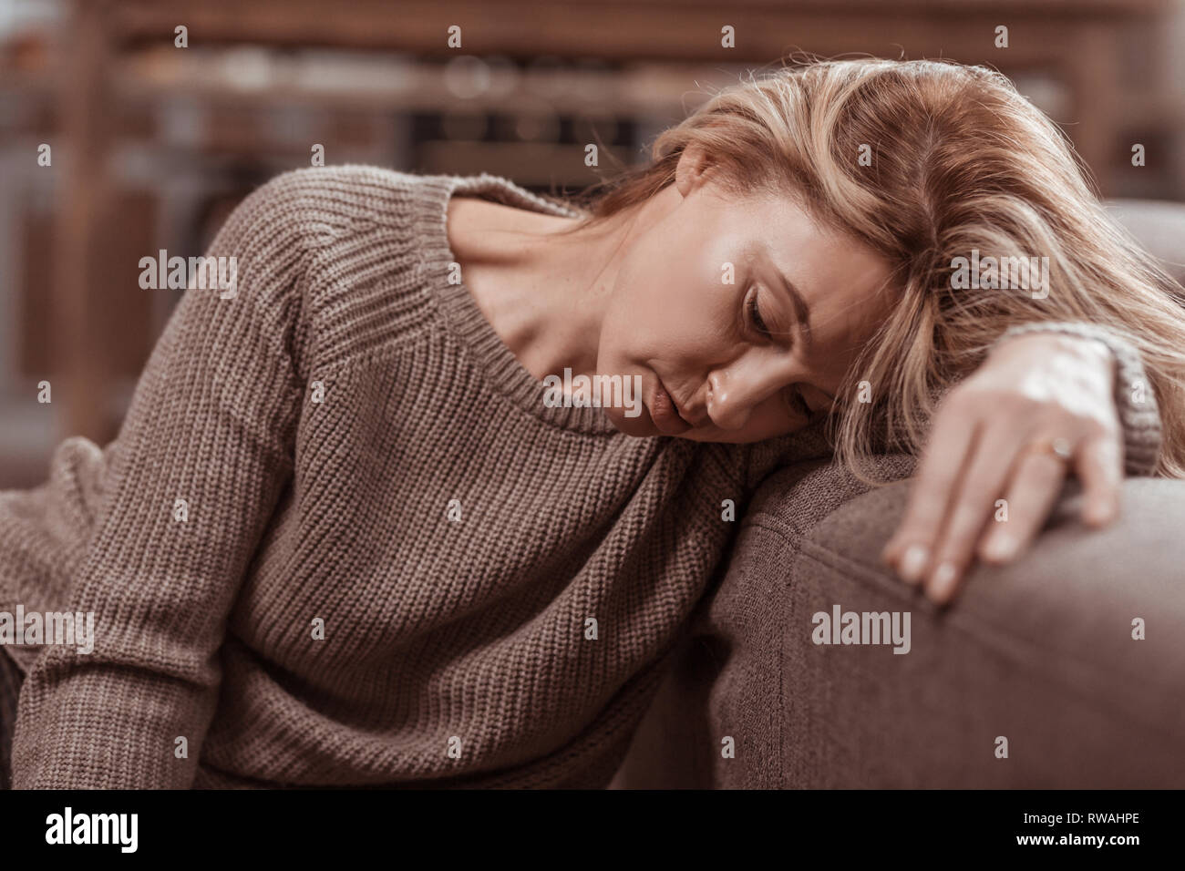 Close up of woman feeling awful after divorce with husband Stock Photo ...