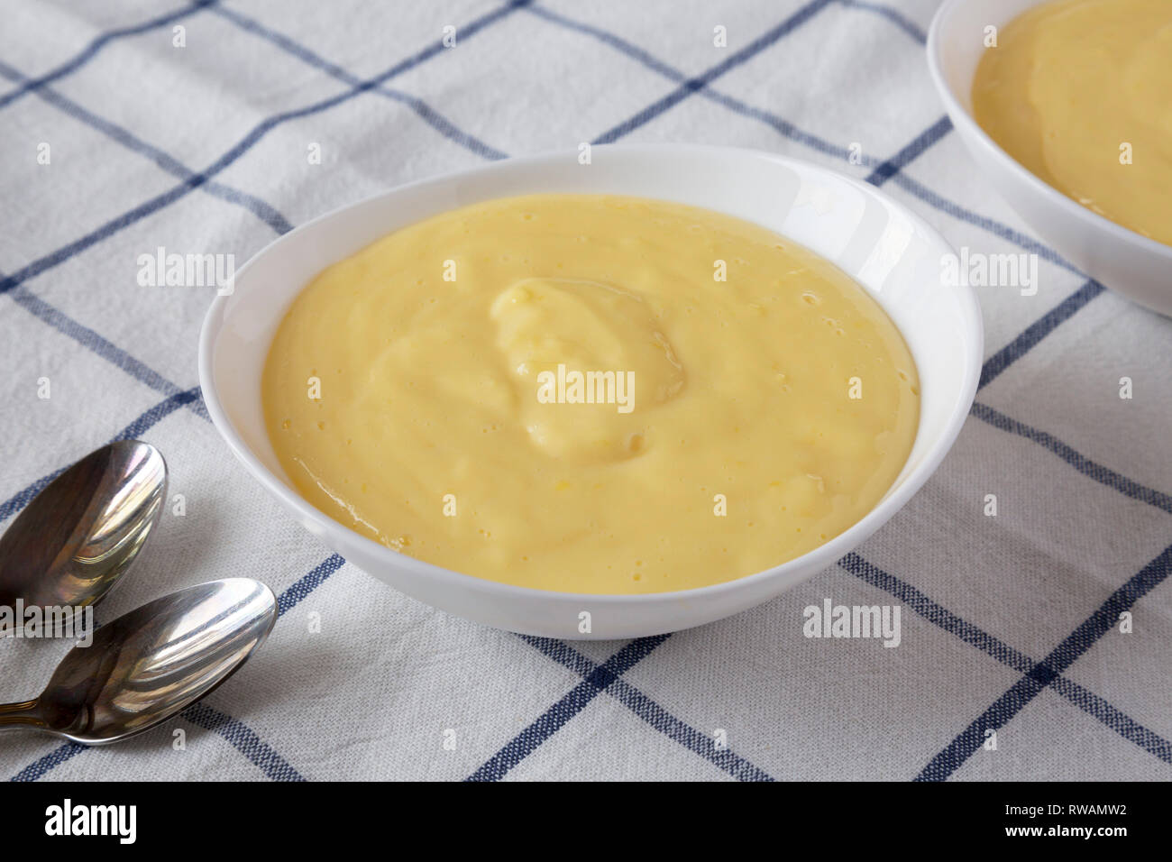 Homemade vanilla custard pudding on cloth, side view Stock Photo - Alamy