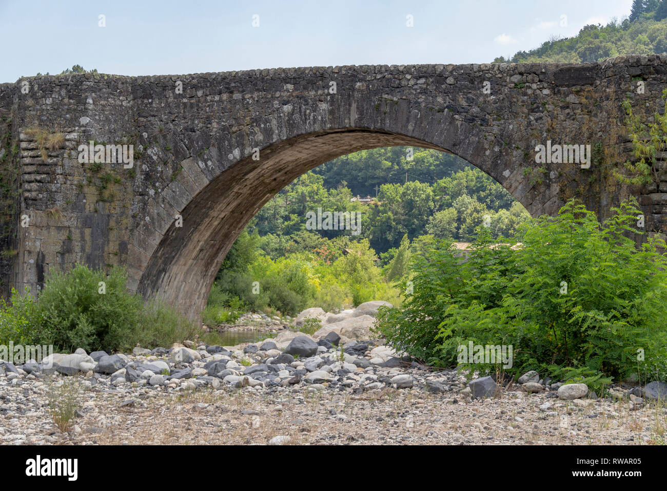 historic stone bridge at the Ardeche river in southern France Stock ...