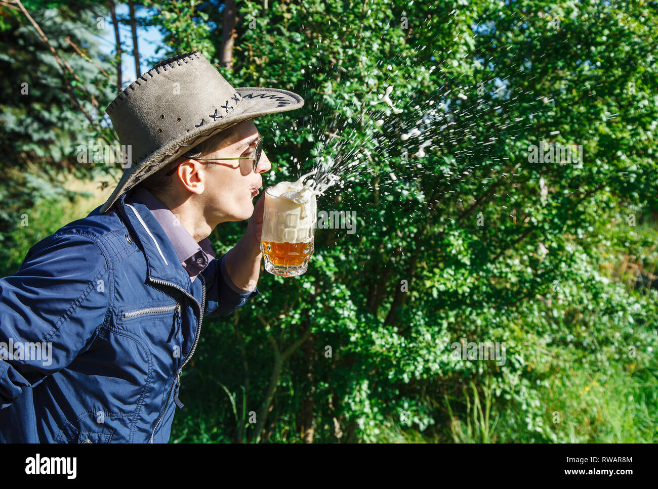 Cowboy drinking beer hi-res stock photography and images - Alamy