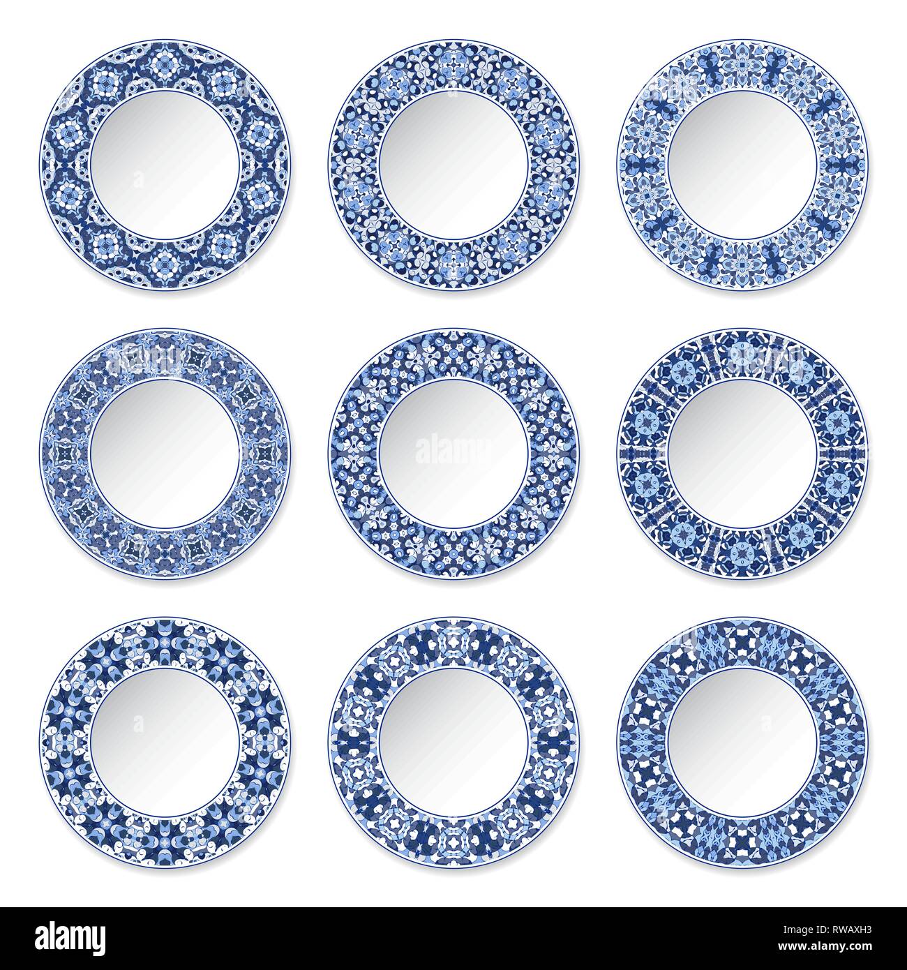Set of decorative plates with a circular blue pattern, top view. White ...