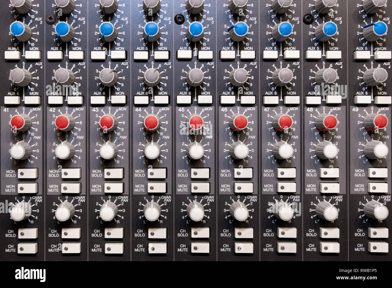 Abstract view of Professional audio mixing console with faders and ...