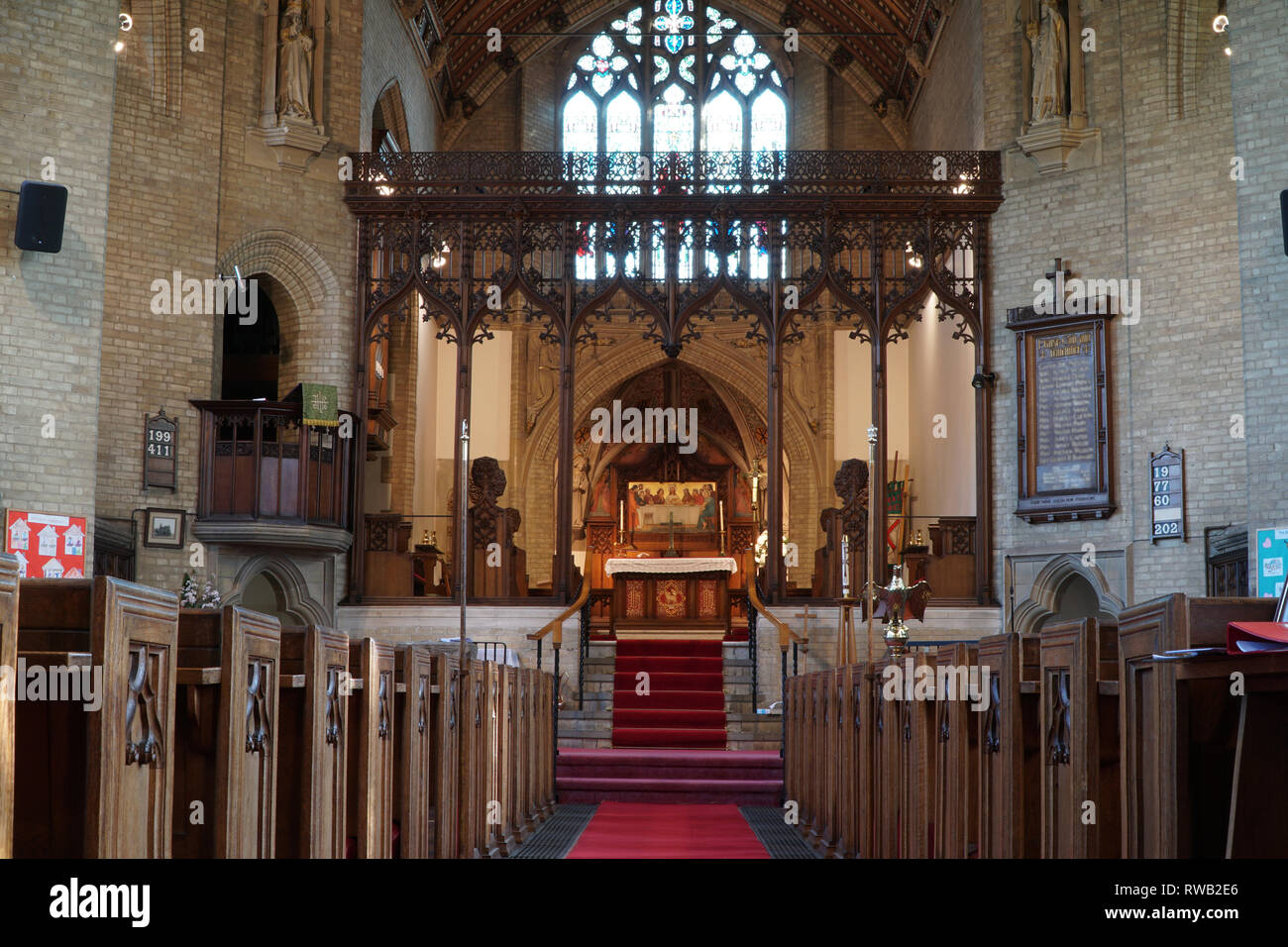 Interior of a church looking down the central aisle towards the high ...