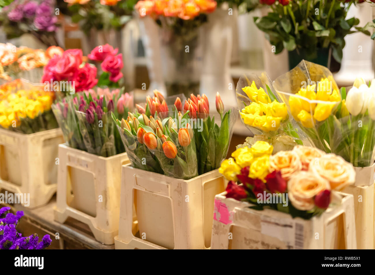 Street flower shop with colourful flowers Stock Photo - Alamy