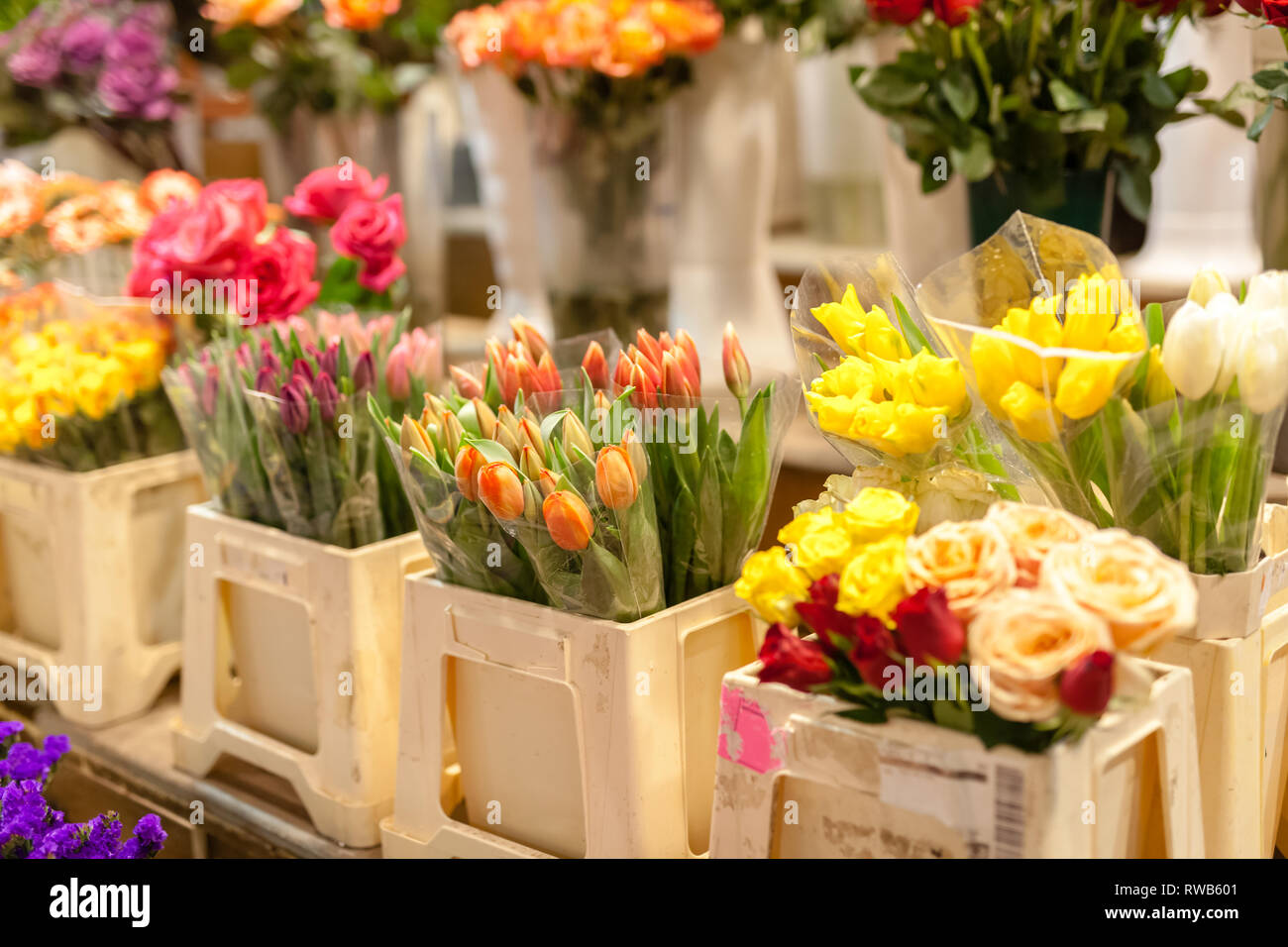 Street flower shop with colourful flowers Stock Photo - Alamy