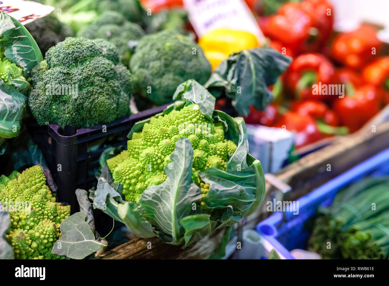Variety of green vegetables in a local market Stock Photo - Alamy