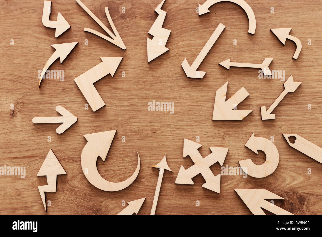 Set of Direction signs over wooden background Stock Photo - Alamy