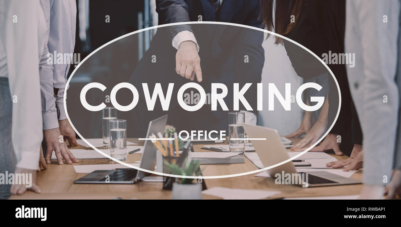 Coworking word. Business team working in office Stock Photo - Alamy