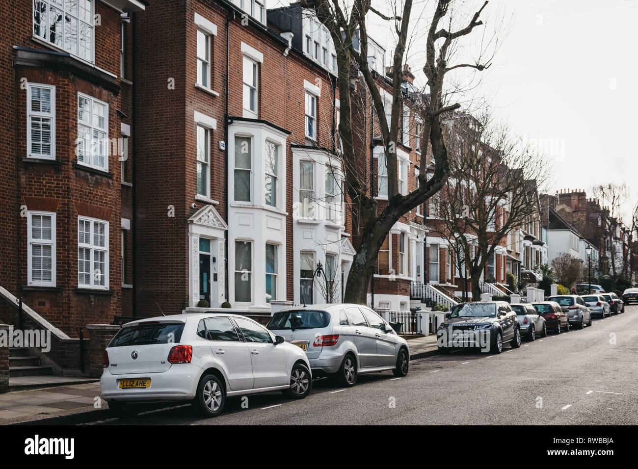 London, UK - March 2, 2019: Row of typical British terraced houses in ...