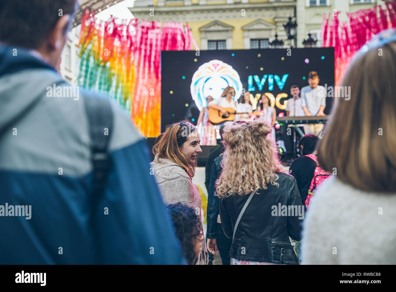 LVIV, UKRAINE - June 23, 2018: people listening music from the scene ...