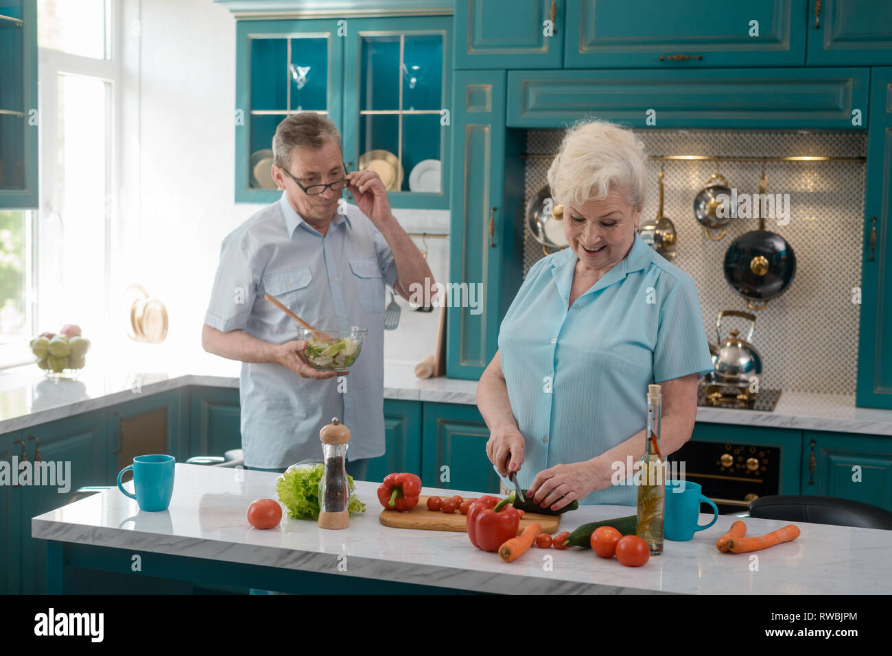 Husband helps wife hi-res stock photography and images - Alamy