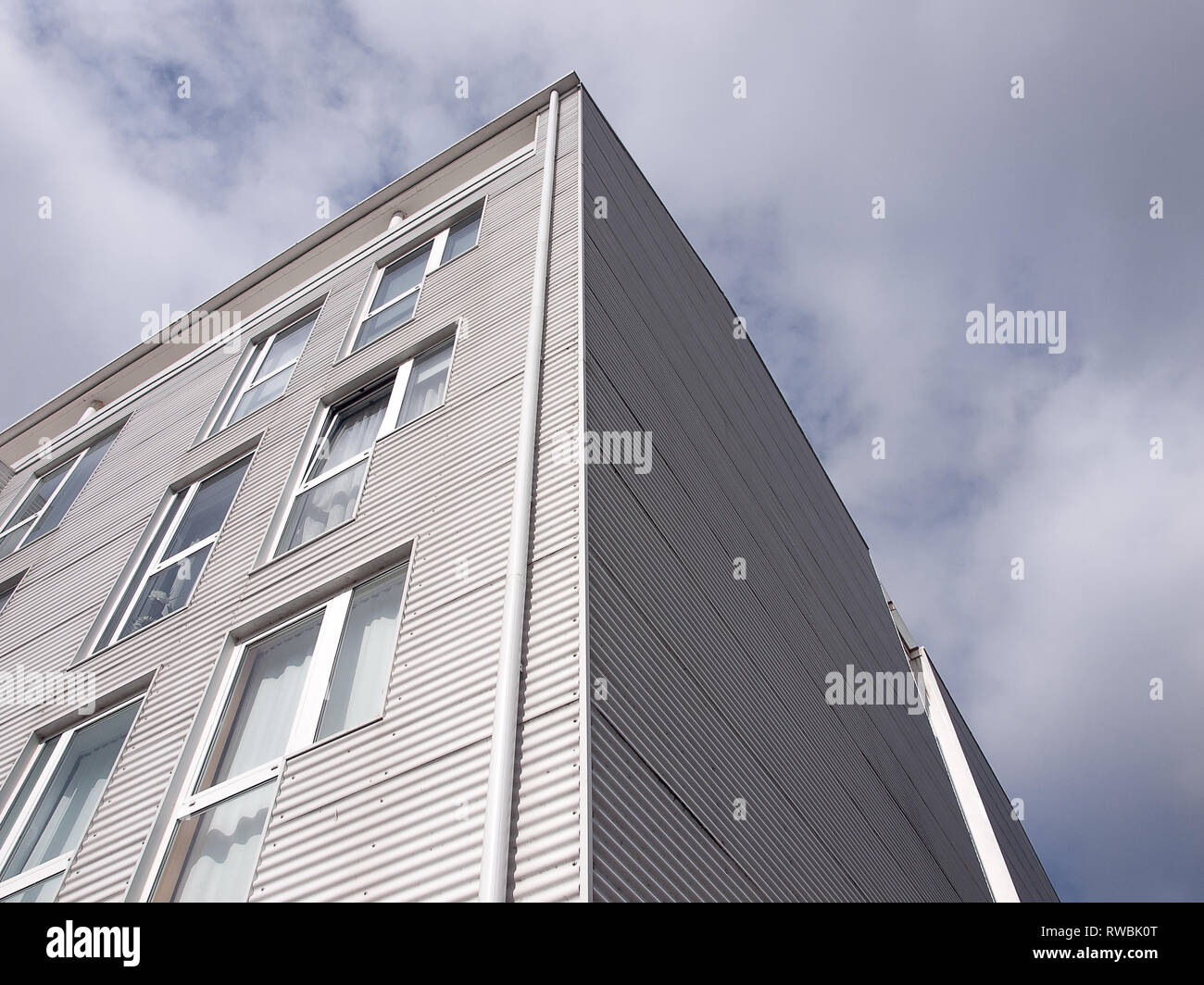 Building facade with metallic cladding. Construction elements of modern ...