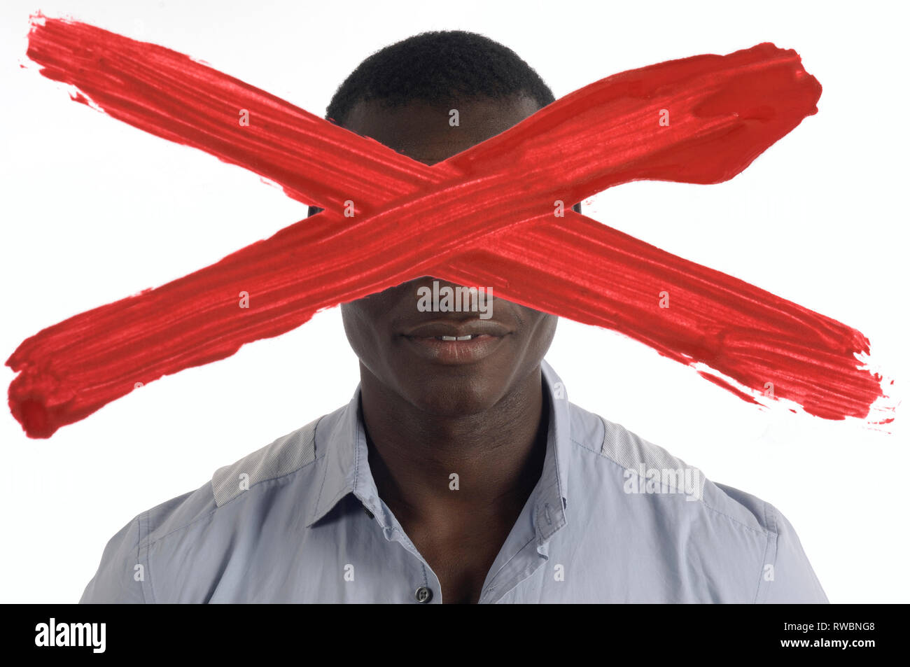 man with a cross on his face Stock Photo - Alamy