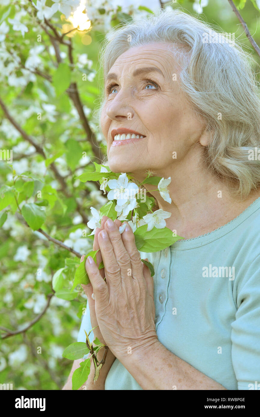 Elderly lady praying hi-res stock photography and images - Alamy