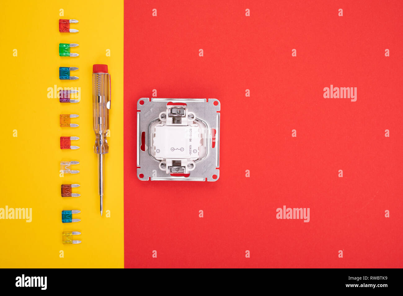 Set of electrical tool and white socket on colorful background Stock ...