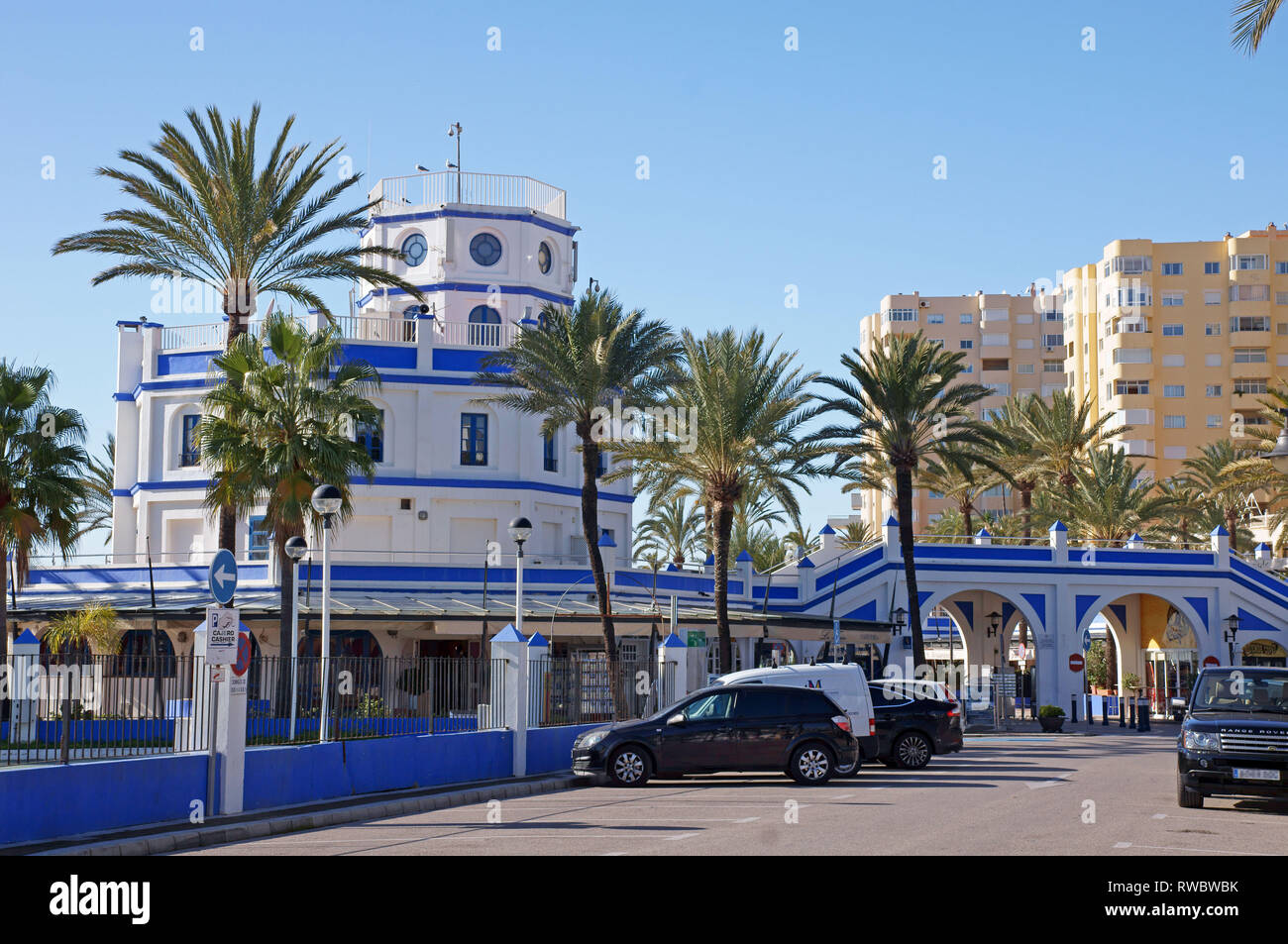 Estepona in Spain: harbour buildings and shops Stock Photo - Alamy