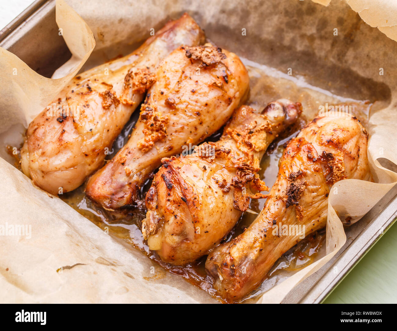 Prepared poultry on cooking paper Stock Photo - Alamy