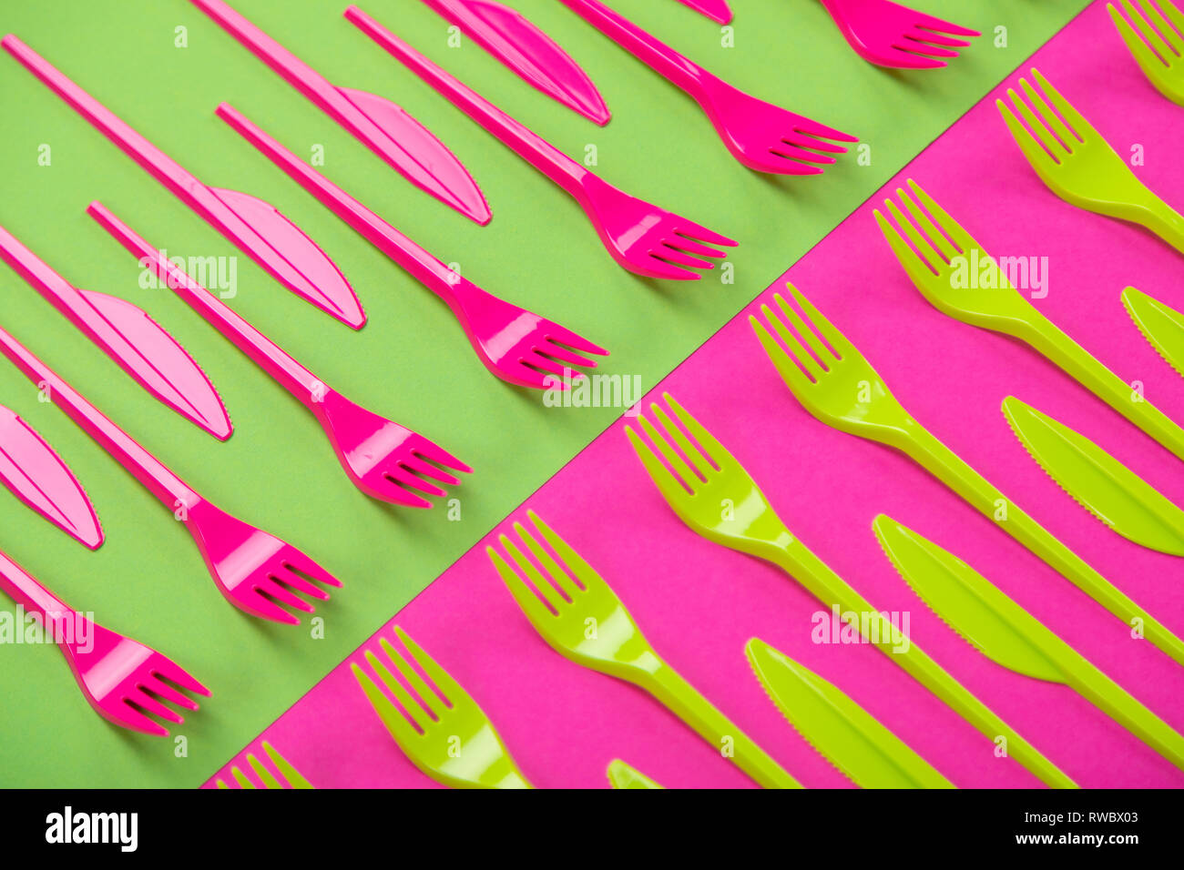 Colorful set of plastic table ware isolated on background Stock Photo ...