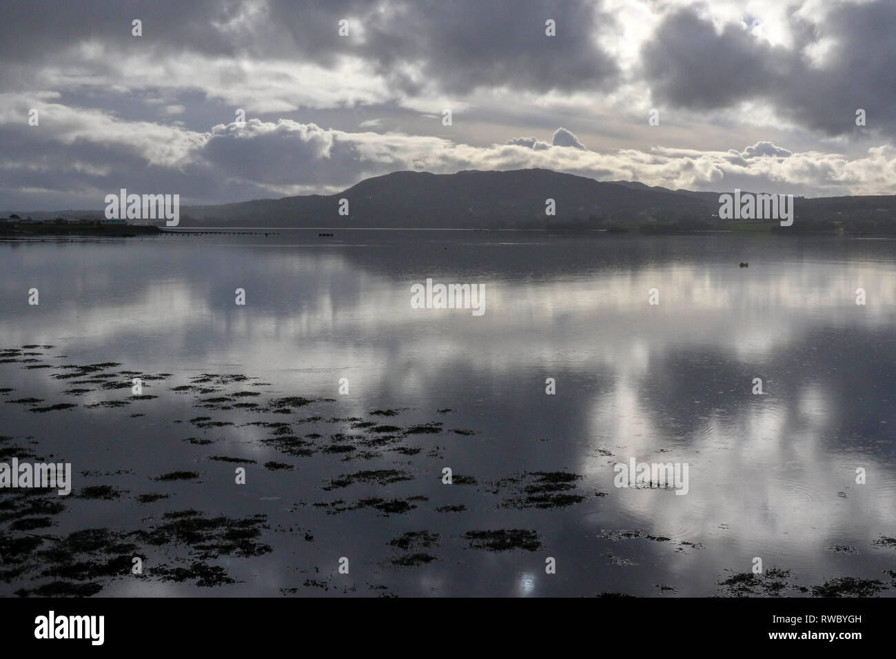 Clouds relected irish sea hi-res stock photography and images - Alamy