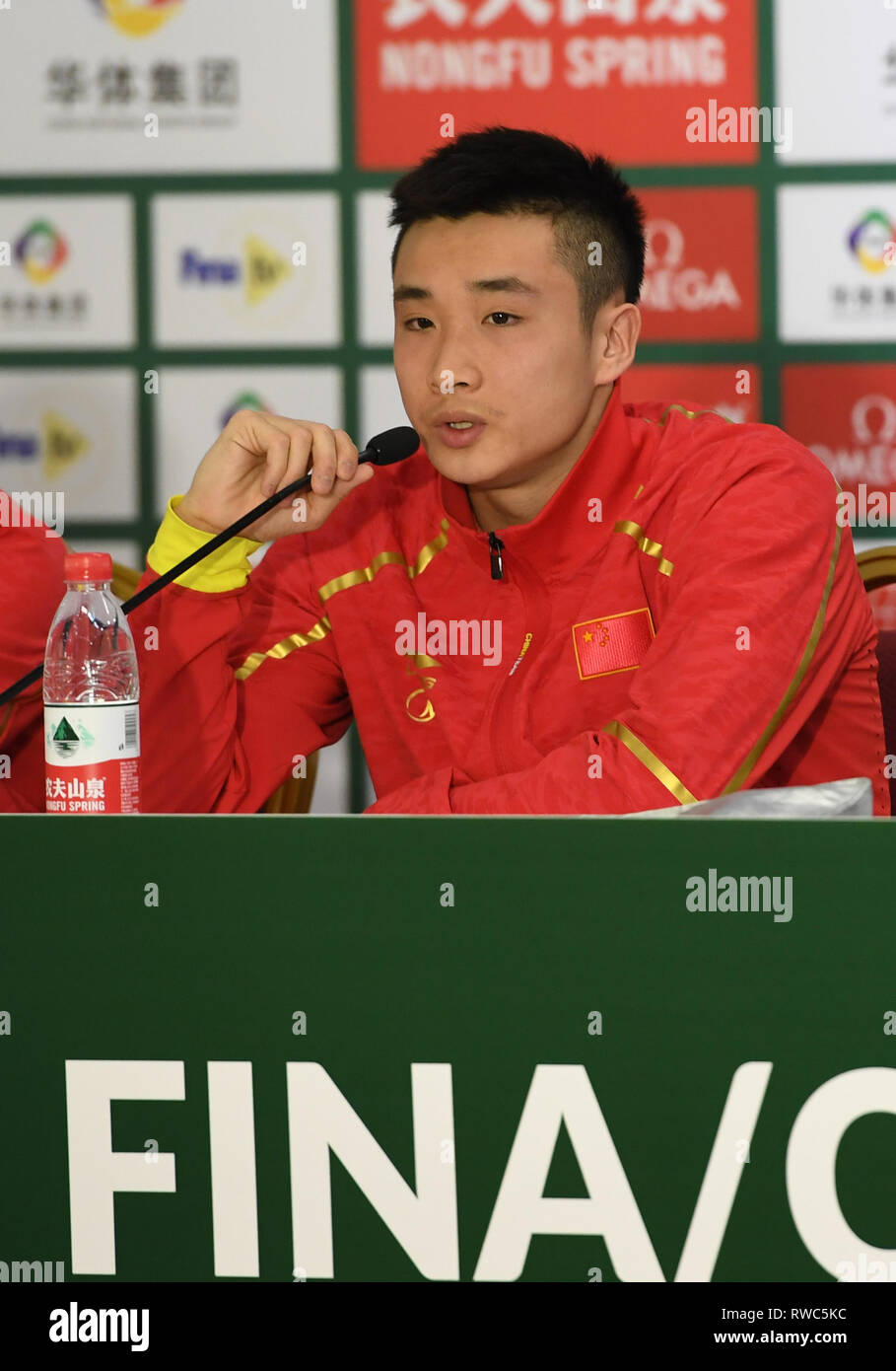 Beijing, China. 6th Mar, 2019. Chinese diver Cao Yuan speaks during the ...