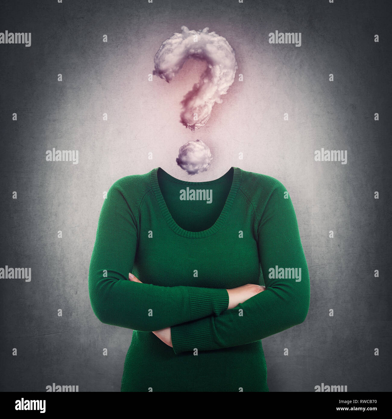 Surreal image as woman with crossed hands and invisible face has a ...