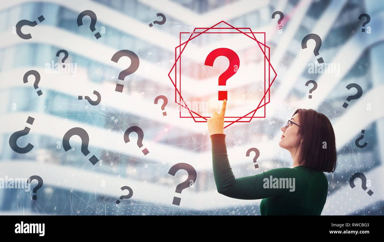 Woman pressing a screen interface selecting red interrogation mark from ...