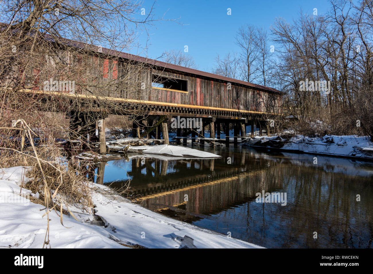 The Clarence covered bridge in Decatur, Wisconsin, on a cold winters ...