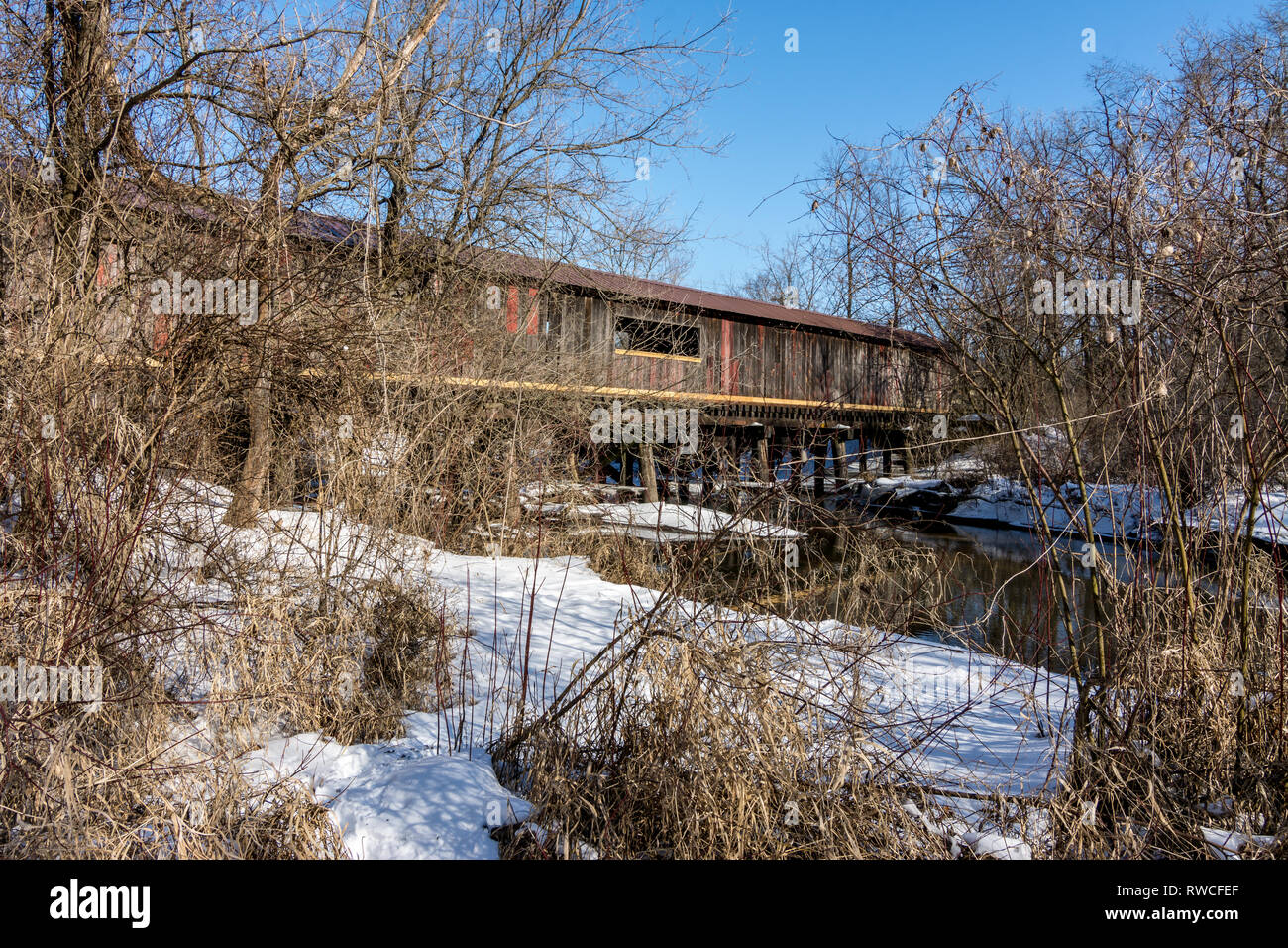 The Clarence covered bridge in Decatur, Wisconsin, on a cold winters ...