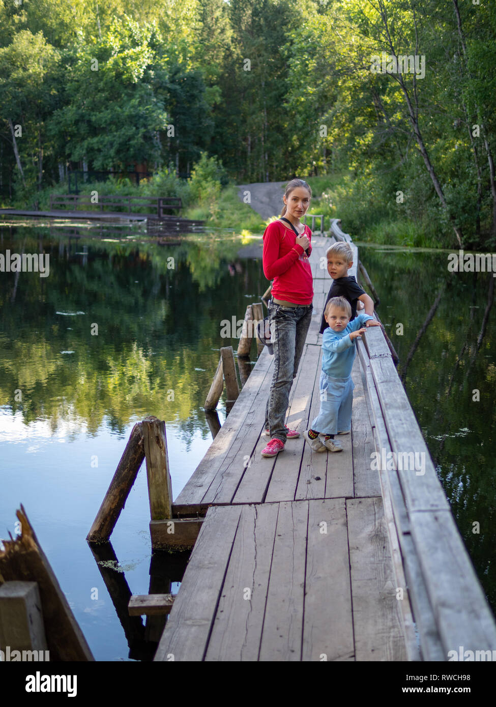 Child crossing rope bridge hi-res stock photography and images - Alamy