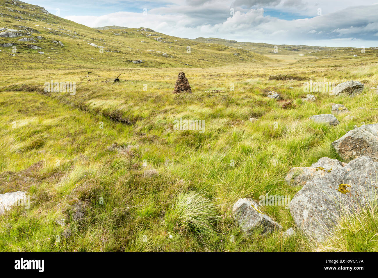Peat harvest for smoked whisky production in Scotland Stock Photo - Alamy