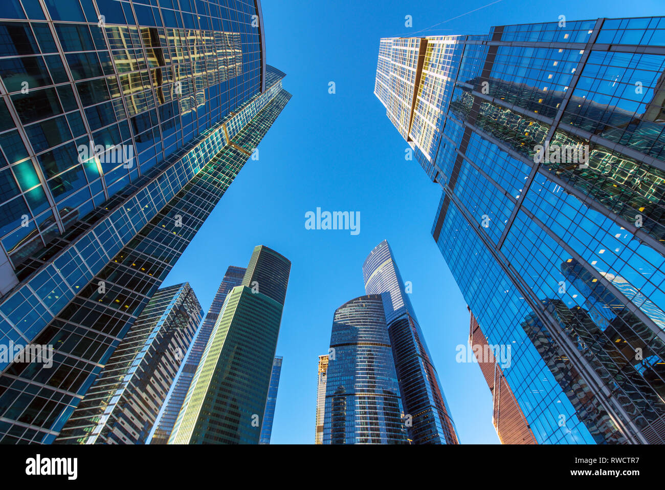 perspective bottom up view on business district skyscrapers Stock Photo ...