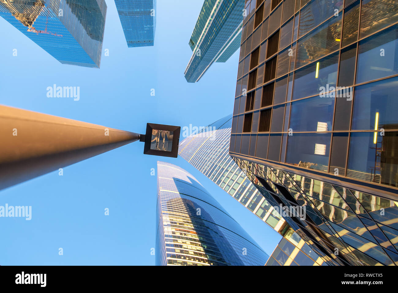 perspective bottom up view on business district skyscrapers Stock Photo ...