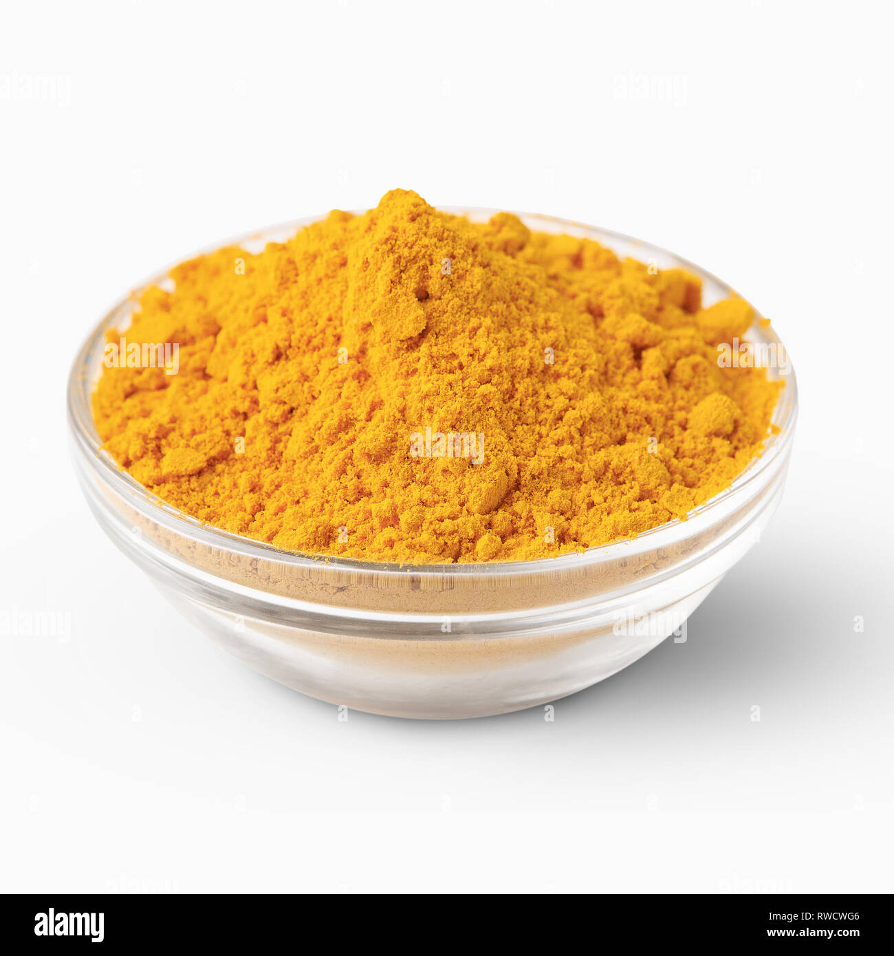 Yellow turmeric powder isolated on white background Stock Photo - Alamy