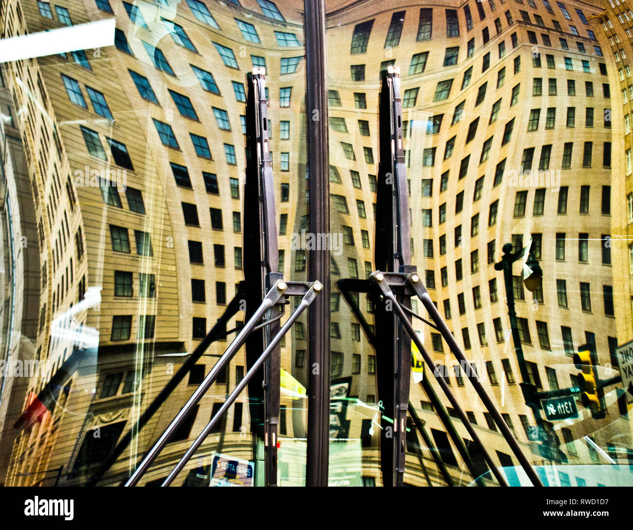 reflection of buildings in windshield of bus Stock Photo - Alamy