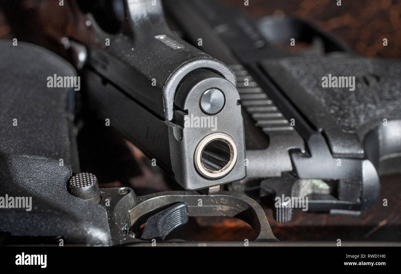 Gun at home table hi-res stock photography and images - Alamy