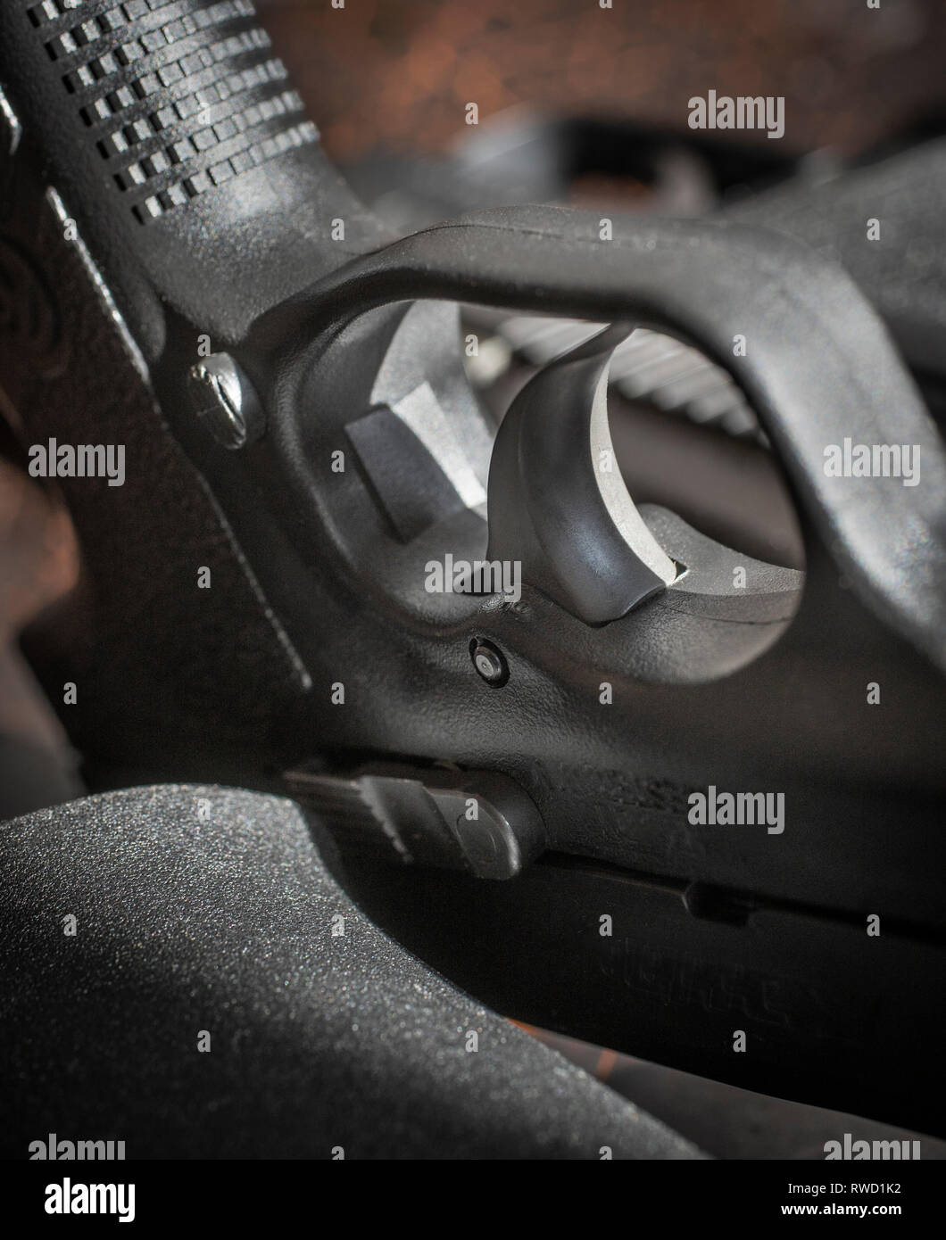 pistol laying on a table Stock Photo - Alamy