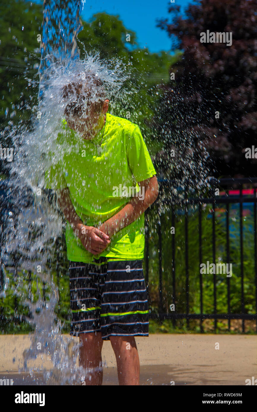 Wet shirt kid hi-res stock photography and images - Alamy