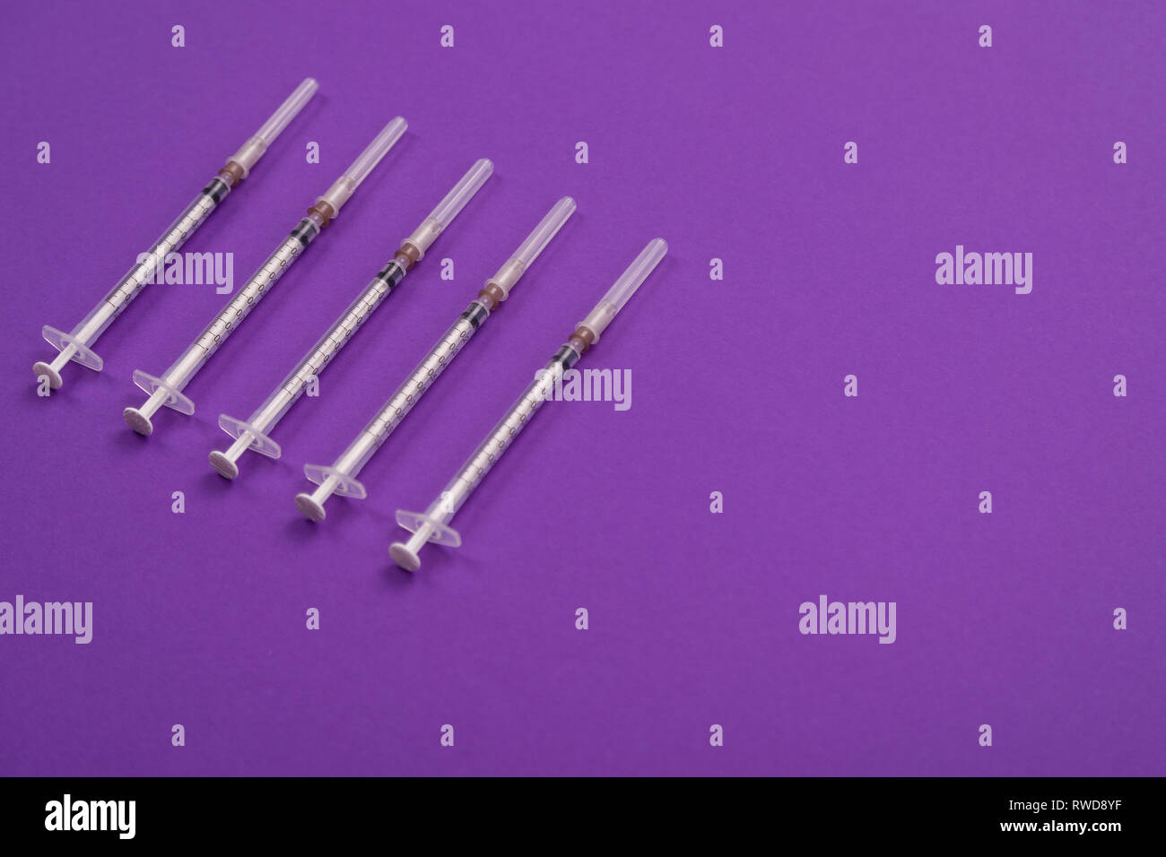 1-ml syringes isolated on a bright background Stock Photo - Alamy