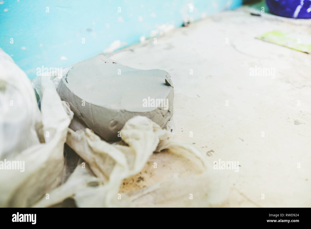 Clay on table at pottery workshop ready for molding Stock Photo - Alamy