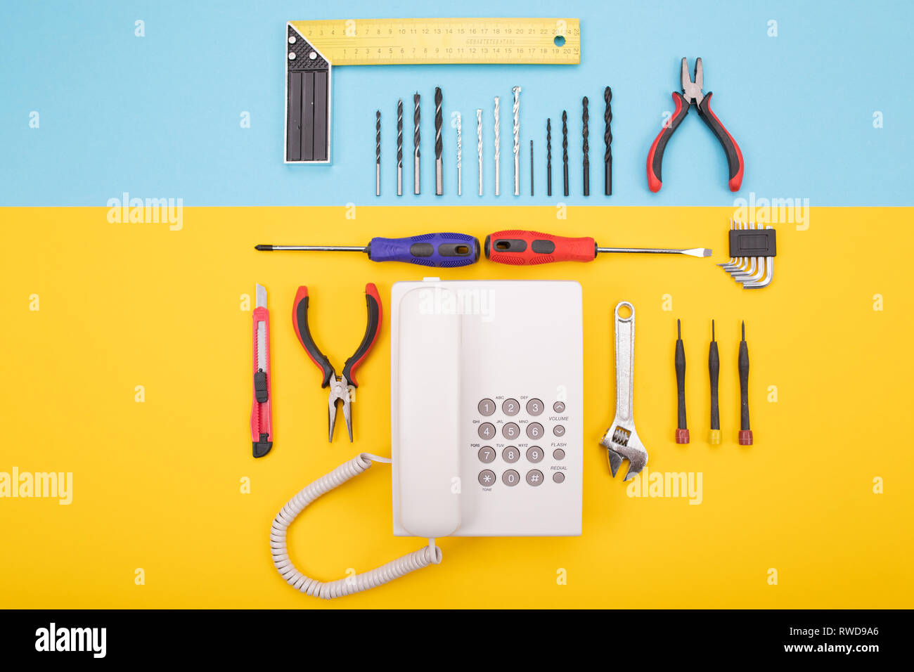 set of metalwork tools with phone on colorful background Stock Photo ...