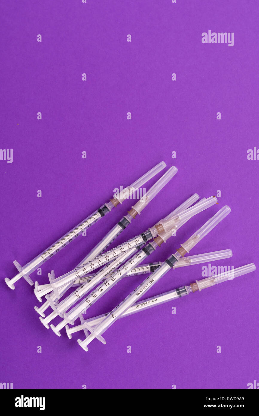 1-ml syringes isolated on a bright background Stock Photo - Alamy