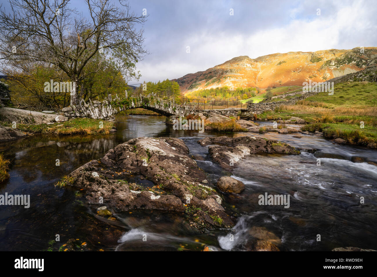 Winter light at Slater Bridge over the River Brathay in Little Langdale ...