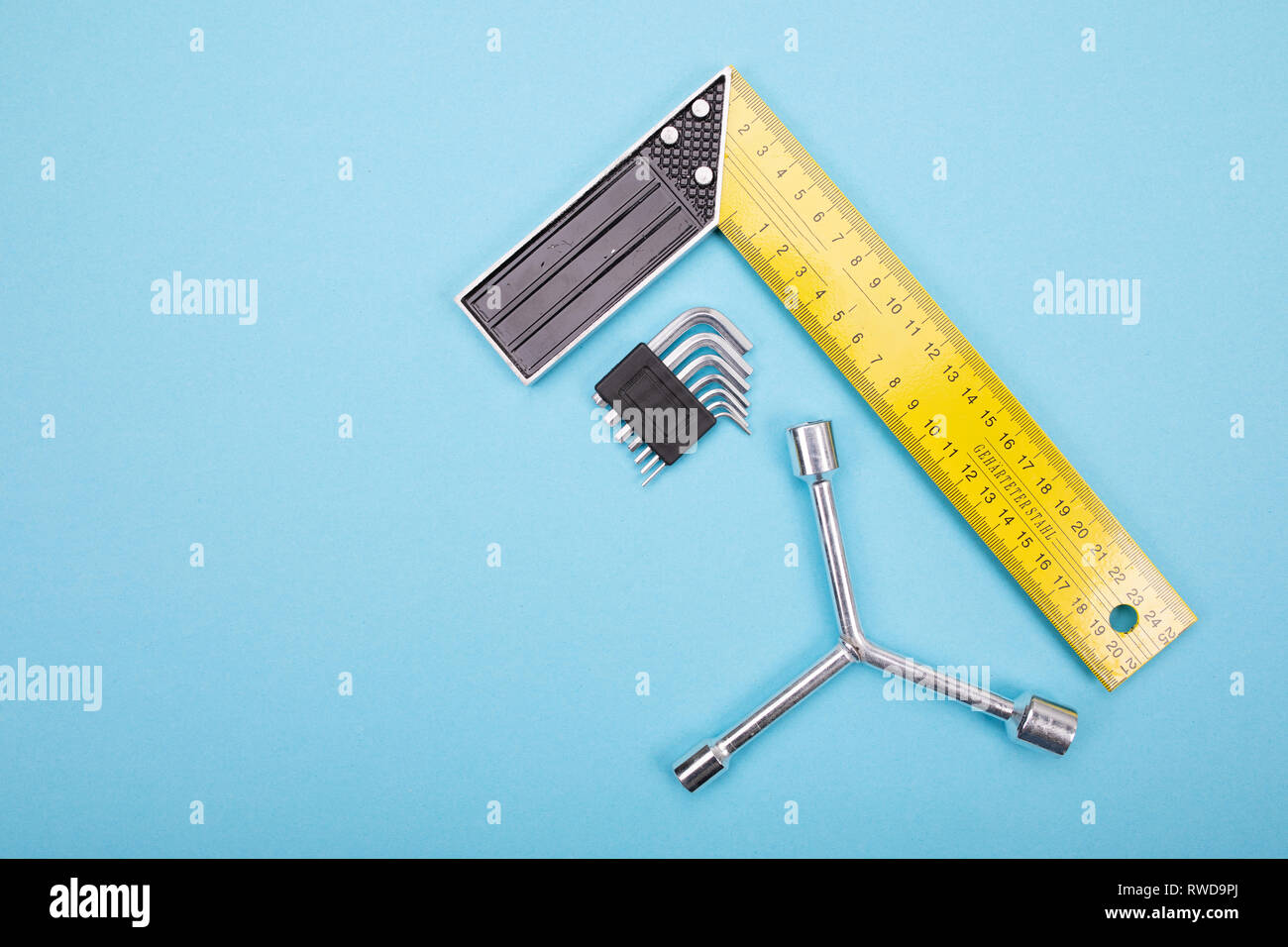 Set of different tools on blue background Stock Photo - Alamy
