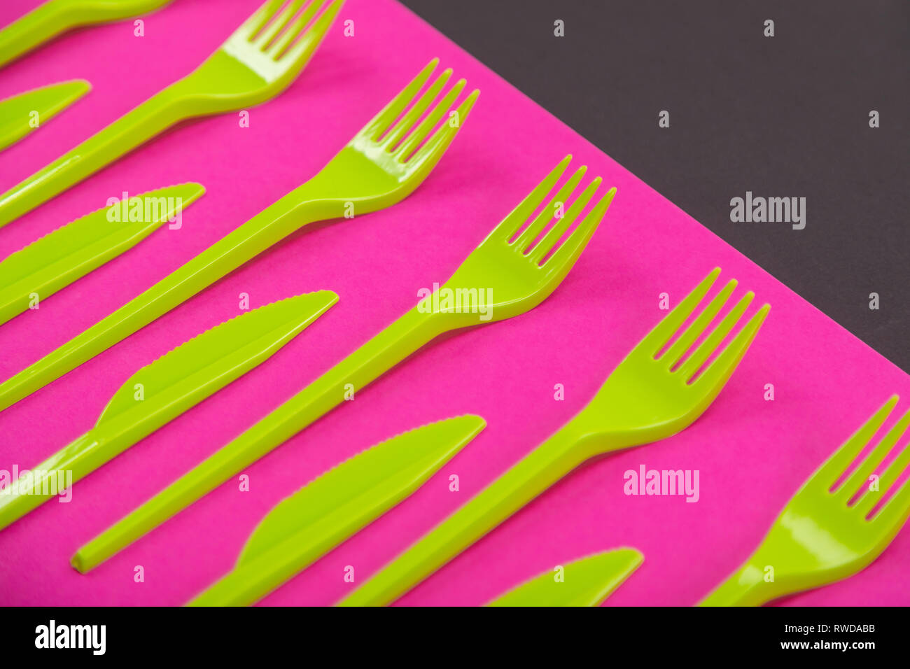 Colorful set of plastic table ware isolated on background Stock Photo ...