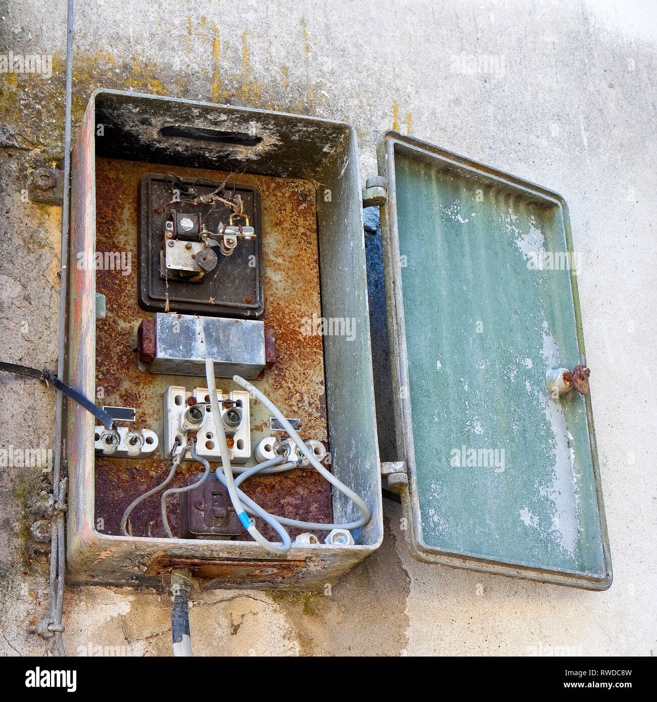 Old electrical panel against a brick wall Stock Photo - Alamy