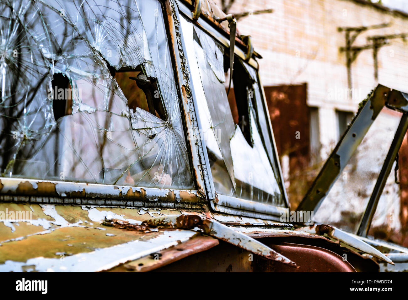 Vehicles left to decompose out the back of the police station inside ...