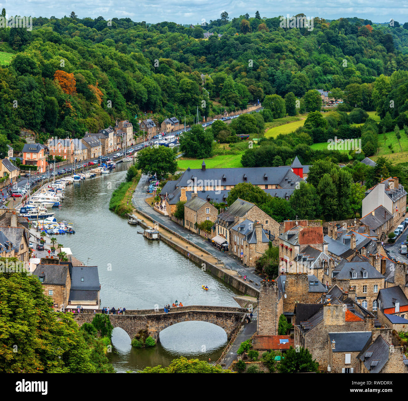 Aerial view of the historic town of Dinan with Rance river with ...