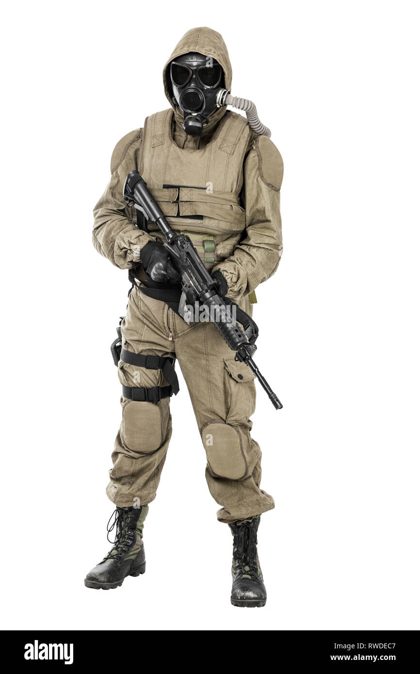 Post apocalypse survivor with weapons and gas mask, studio shot Stock ...
