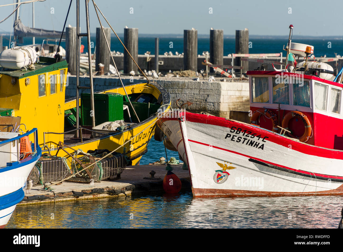 Fishermen`s traditional boats in the fishing port of Setubal, Portugal ...